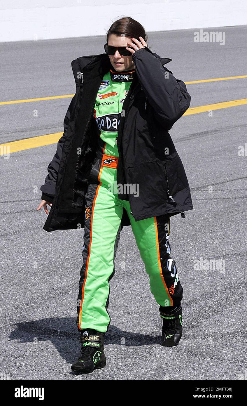 Danica Patrick walks out to her car on pit row for her NASCAR debut in ...