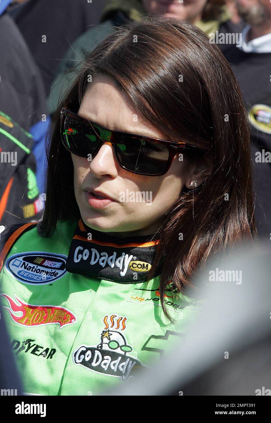 Danica Patrick walks out to her car on pit row for her NASCAR debut in ...