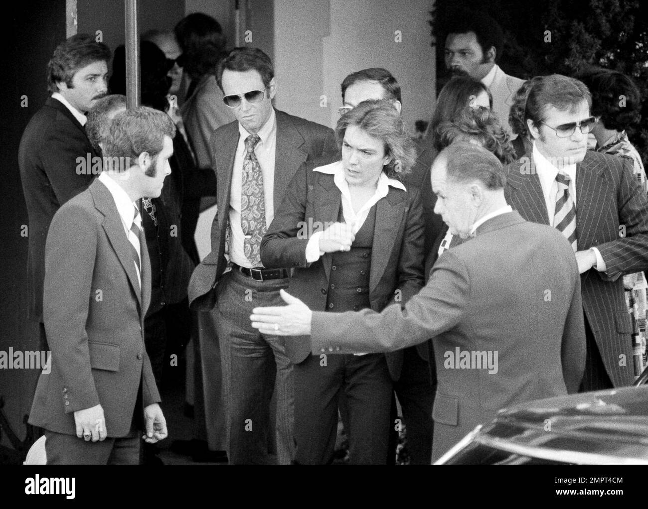 Entertainer David Cassidy, center, leaves a chapel in Los Angeles, Calif., after a non-sectarian ...