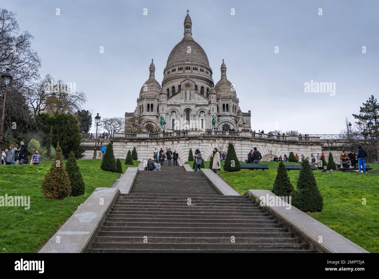 A view looking up the steps of the Sacré-Cœur Basilica in Paris, France ...