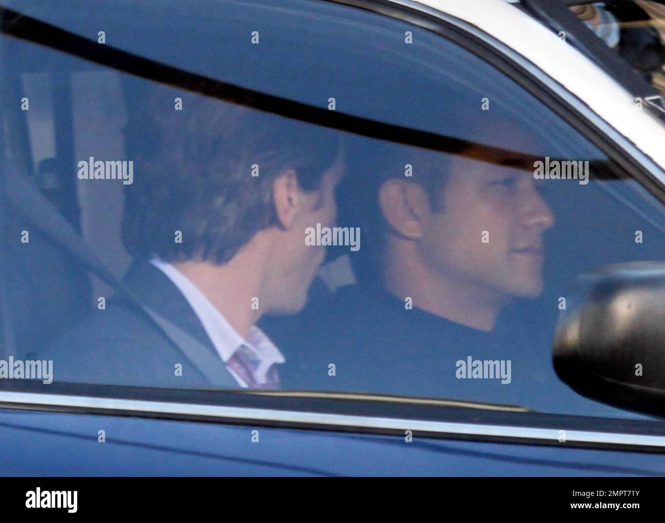 Actors Christian Bale and Joseph Gordon-Levitt film a scene for the ...