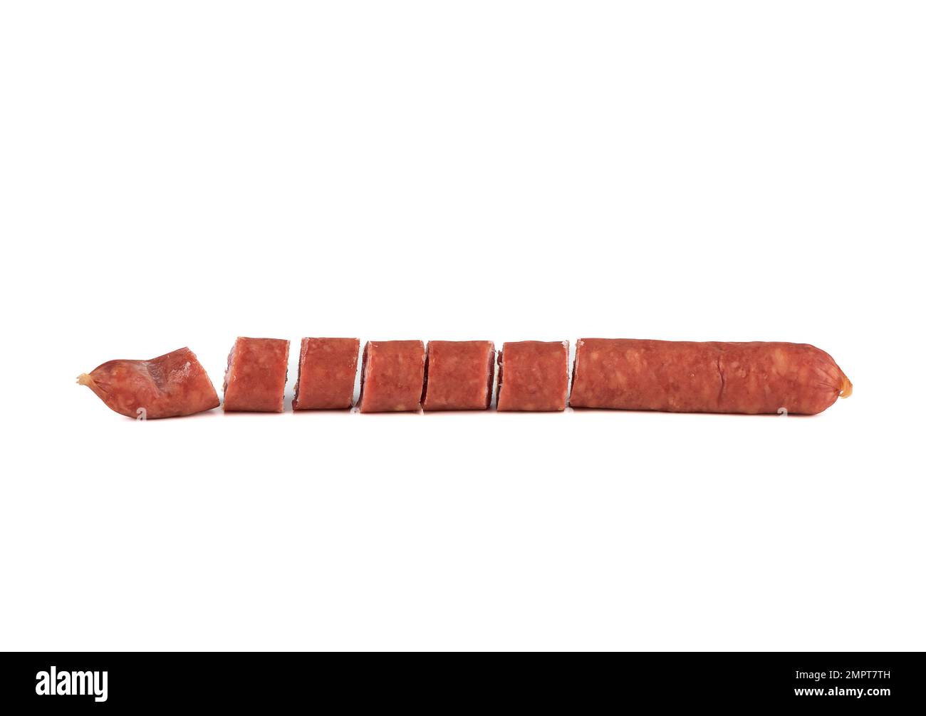 Sliced thin half-smoked sausage on a white background. Copy space Stock ...