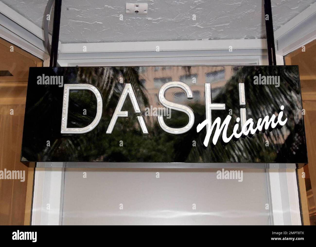 Khloe and Kourtney Kardashian host the ribbon-cutting ceremony that marks the official opening ...