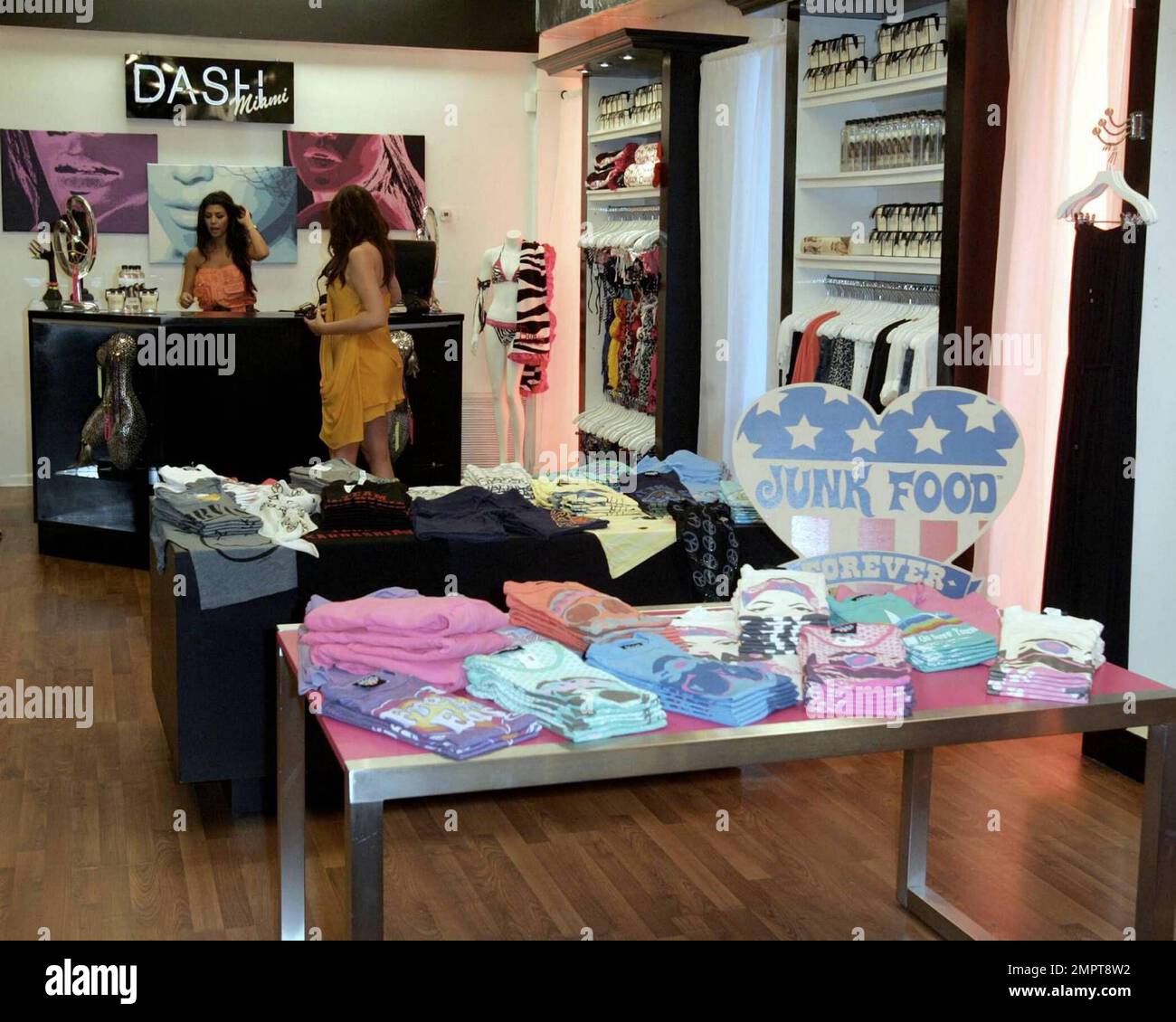 Khloe and Kourtney Kardashian host the ribbon-cutting ceremony that marks the official opening ...