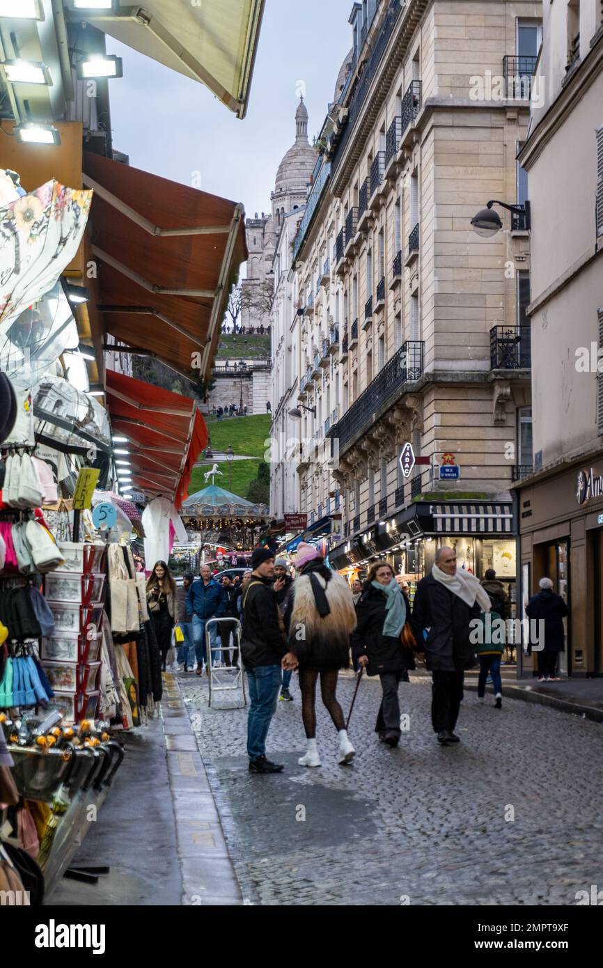 Tourist enjoy shopping through the narrow streets of Montmartre in ...