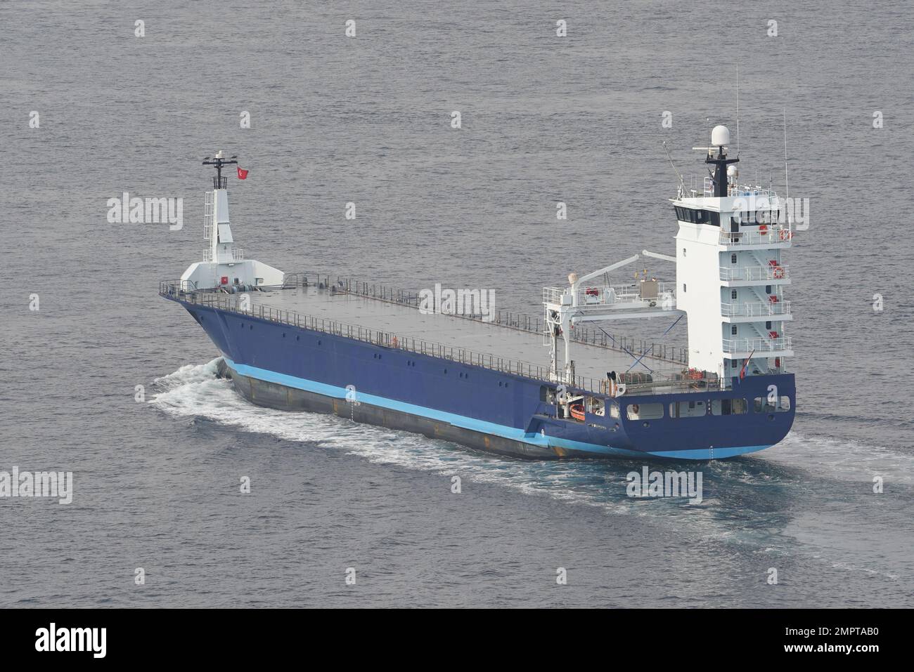 A cargo ship carrying goods between ports Stock Photo - Alamy