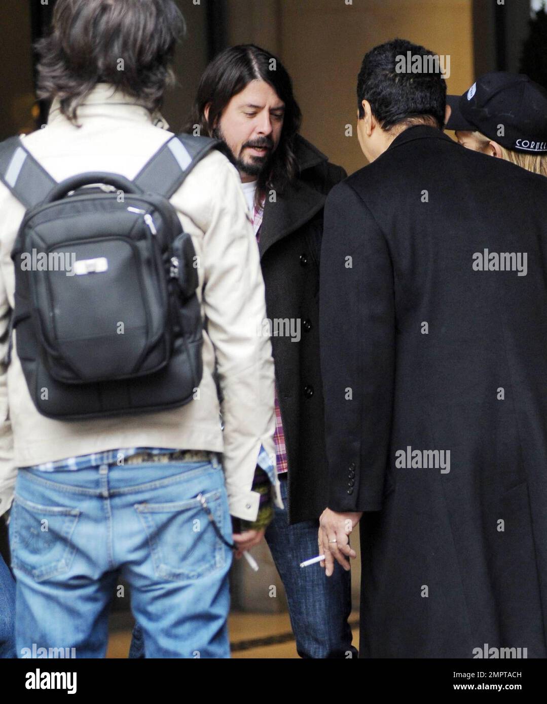 EXCLUSIVE!! Dave Grohl gets animated while hanging outside of his hotel ...