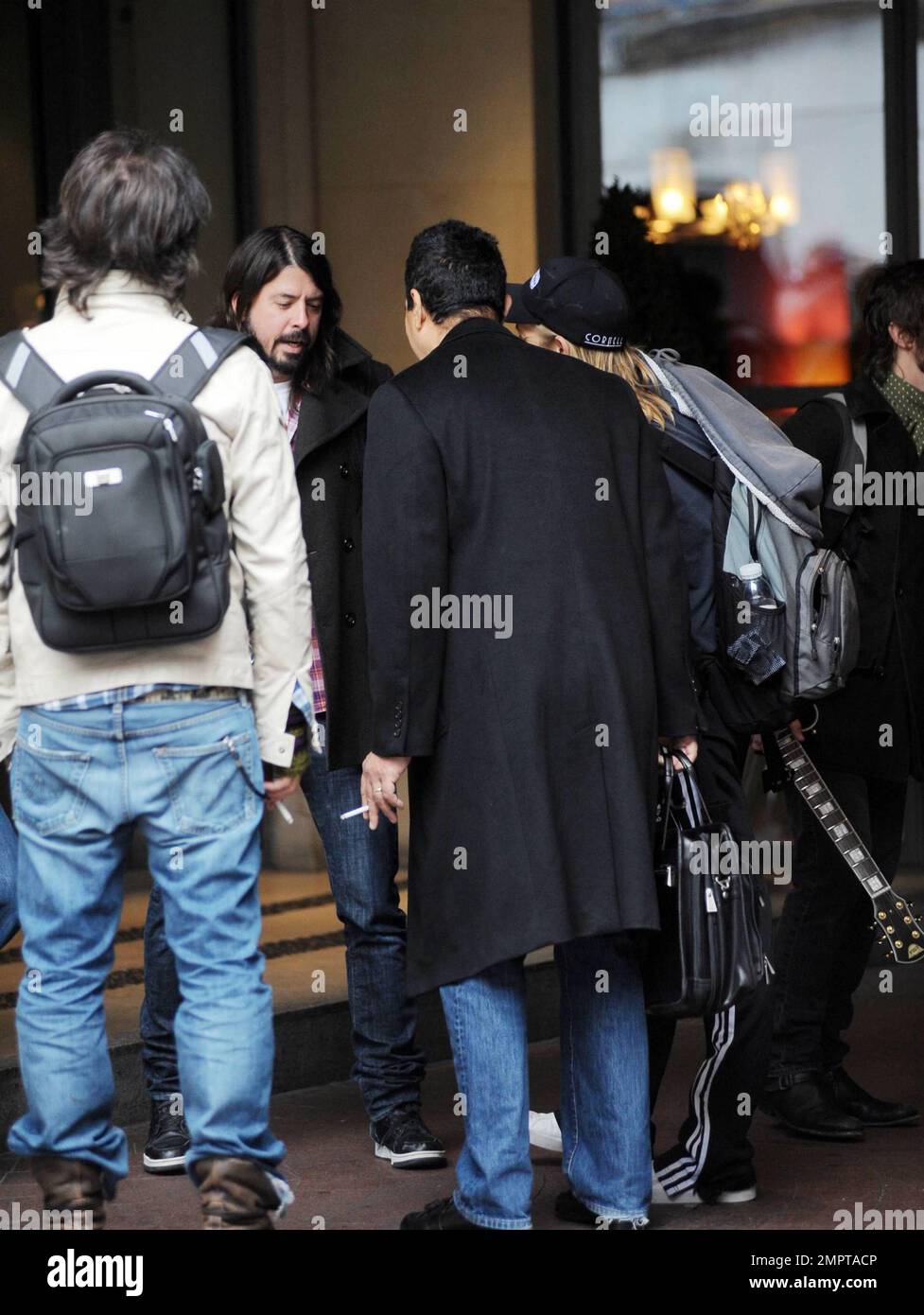 EXCLUSIVE!! Dave Grohl gets animated while hanging outside of his hotel ...