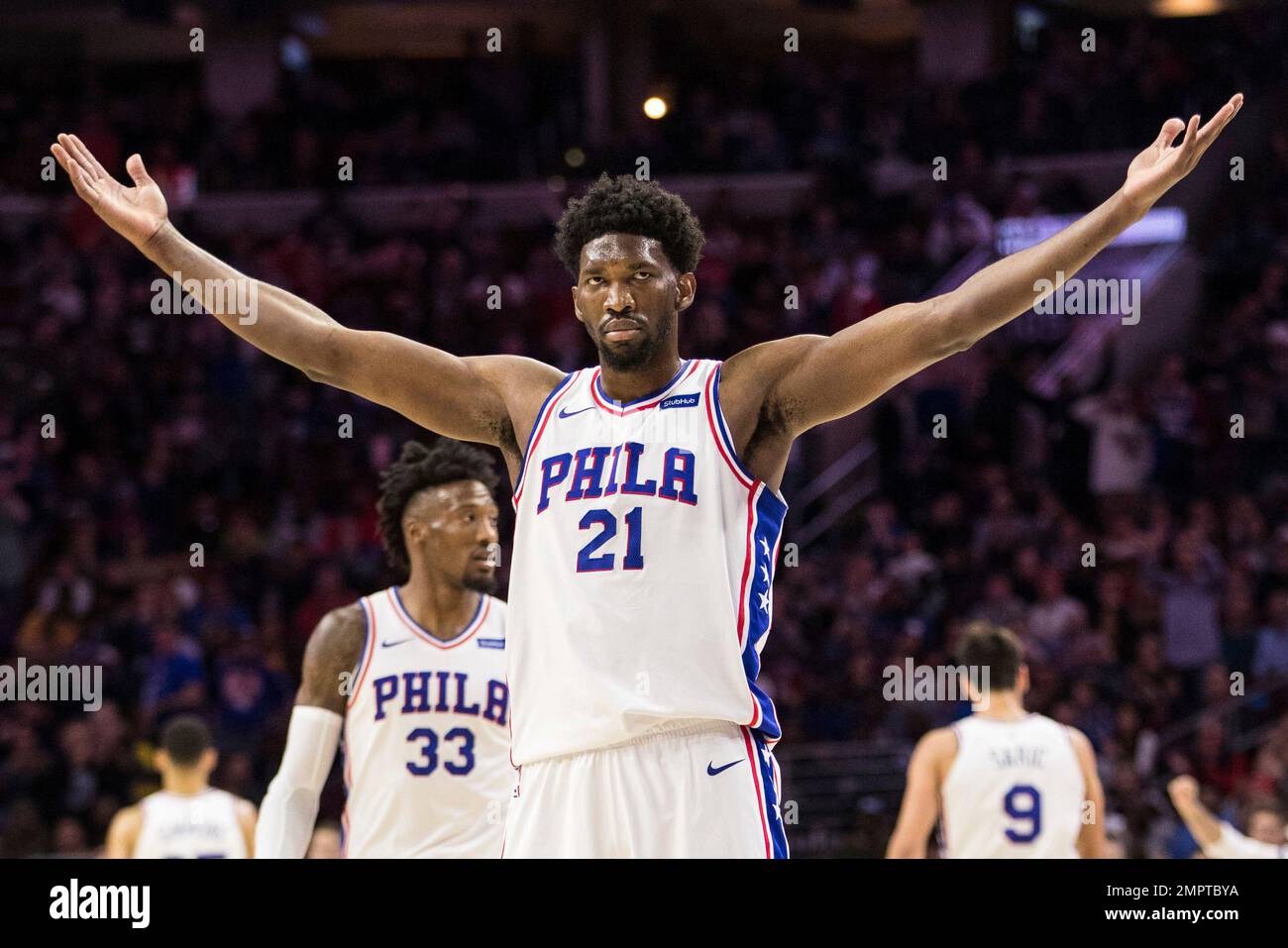 Philadelphia 76ers' Joel Embiid, of Cameroon, reacts during the first ...