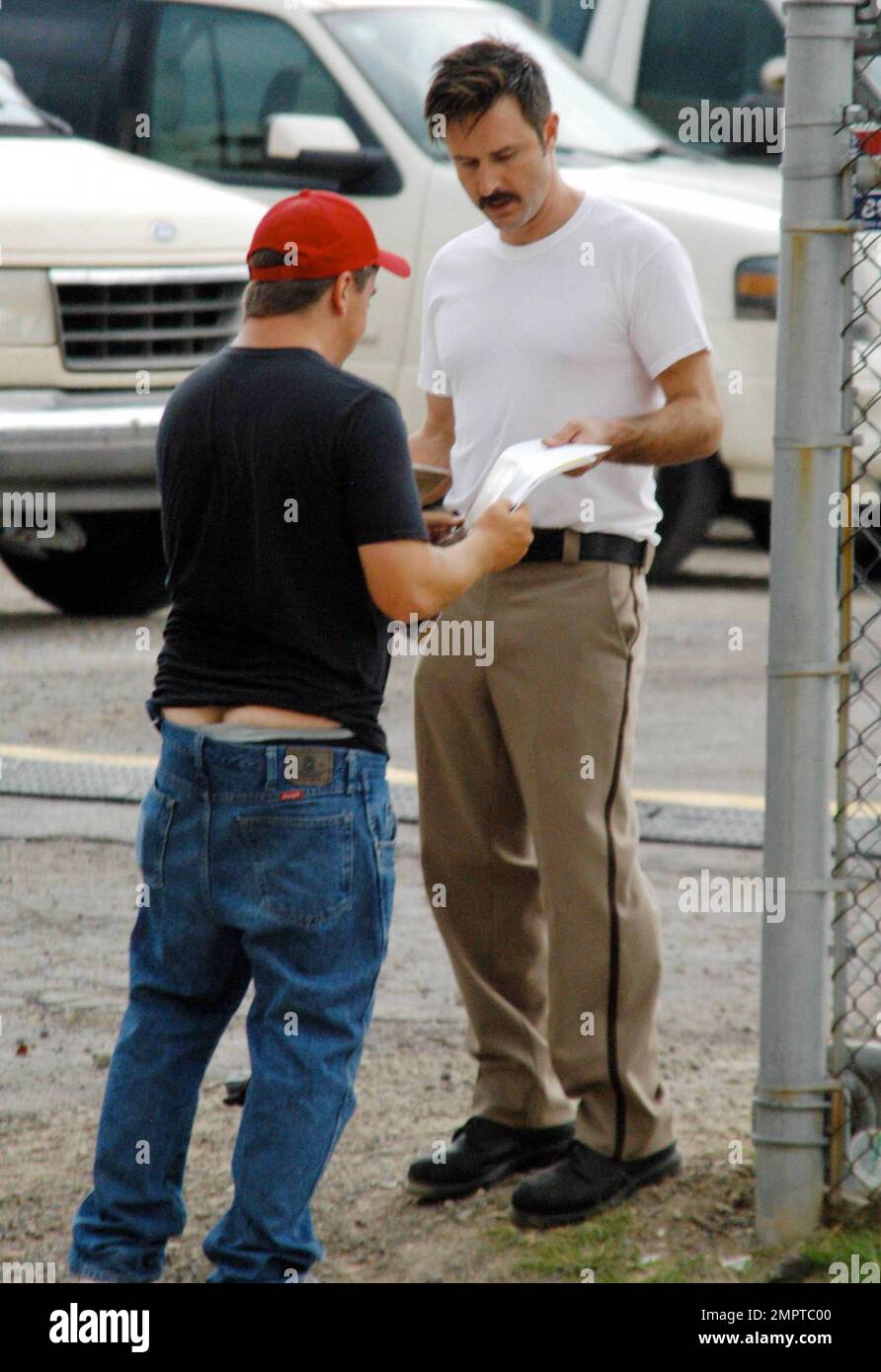 David Arquette goes over some documents on the set of "Scream 4" In the ...