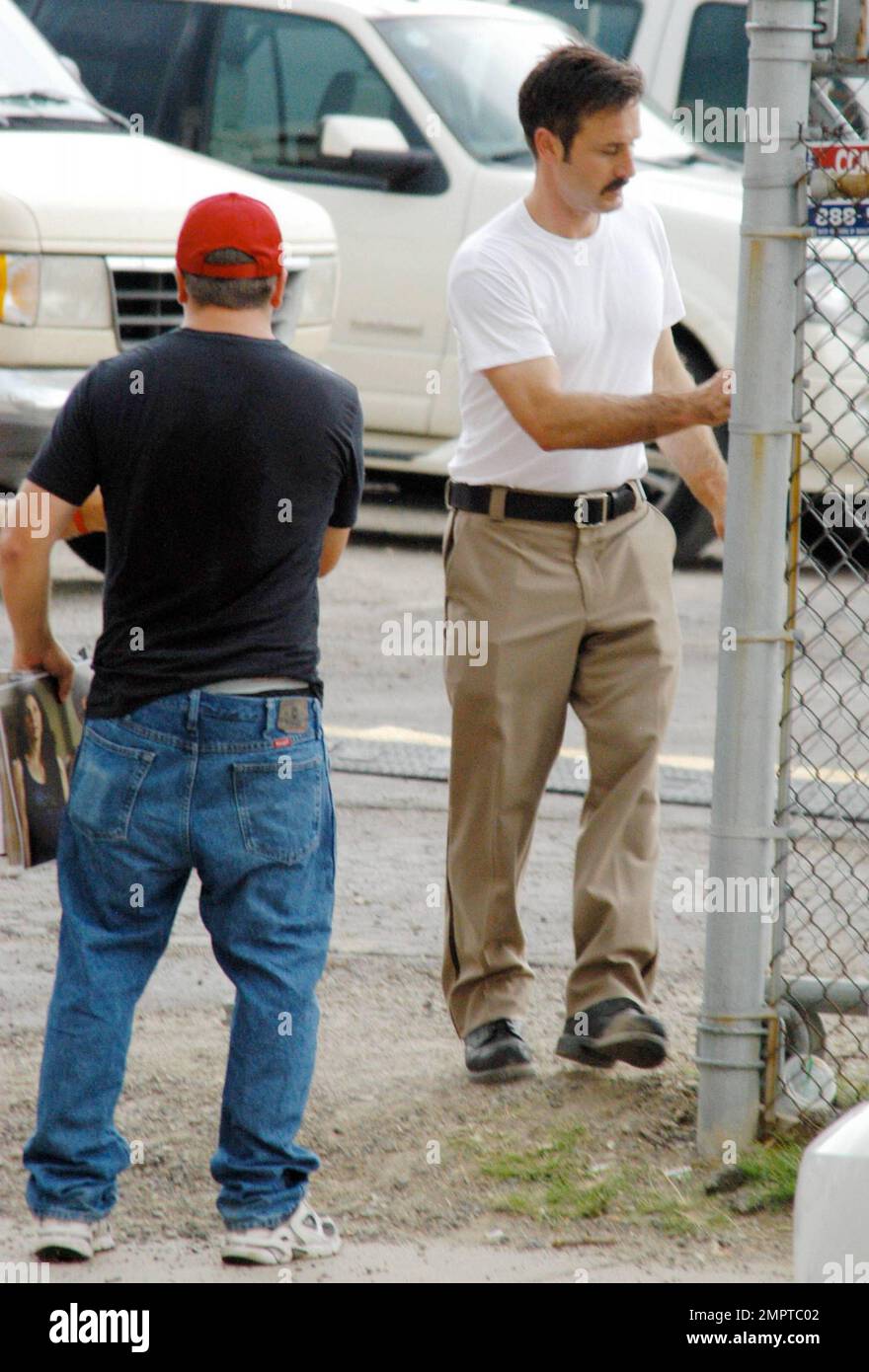 David Arquette goes over some documents on the set of "Scream 4" In the ...