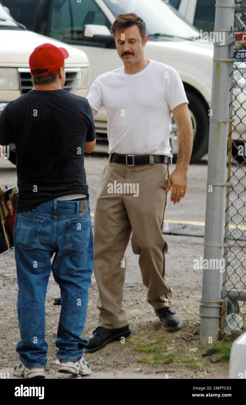 David Arquette goes over some documents on the set of "Scream 4" In the ...