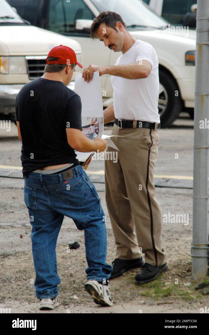 David Arquette goes over some documents on the set of "Scream 4" In the ...