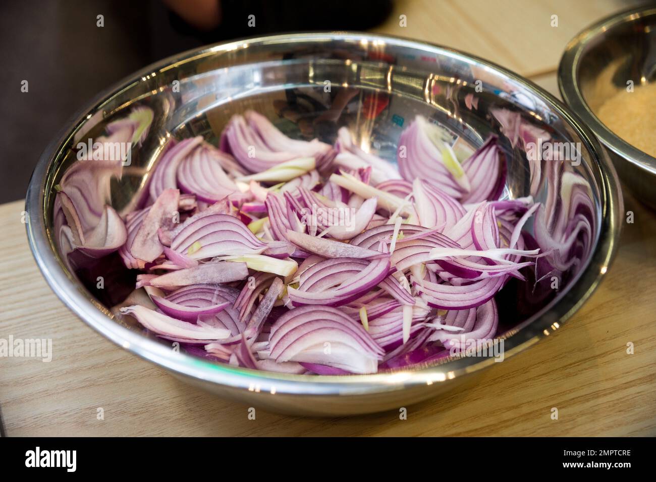 bowl of chopped red onions, raw product before cooking Stock Photo - Alamy