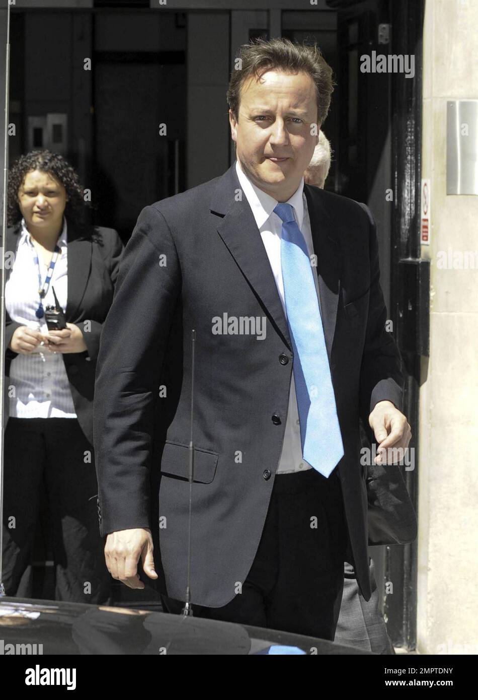 British Prime Minister David Cameron arrives with an entourage at BBC ...