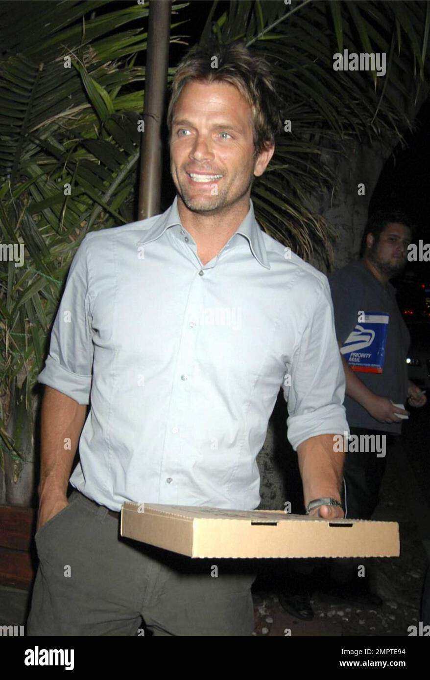 "Baywatch" stud David Chokachi jokingly shows off his belly as he ...