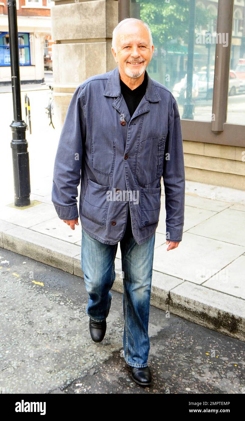 '70s and '80s hearthrob singer and actor David Essex waves and smiles ...