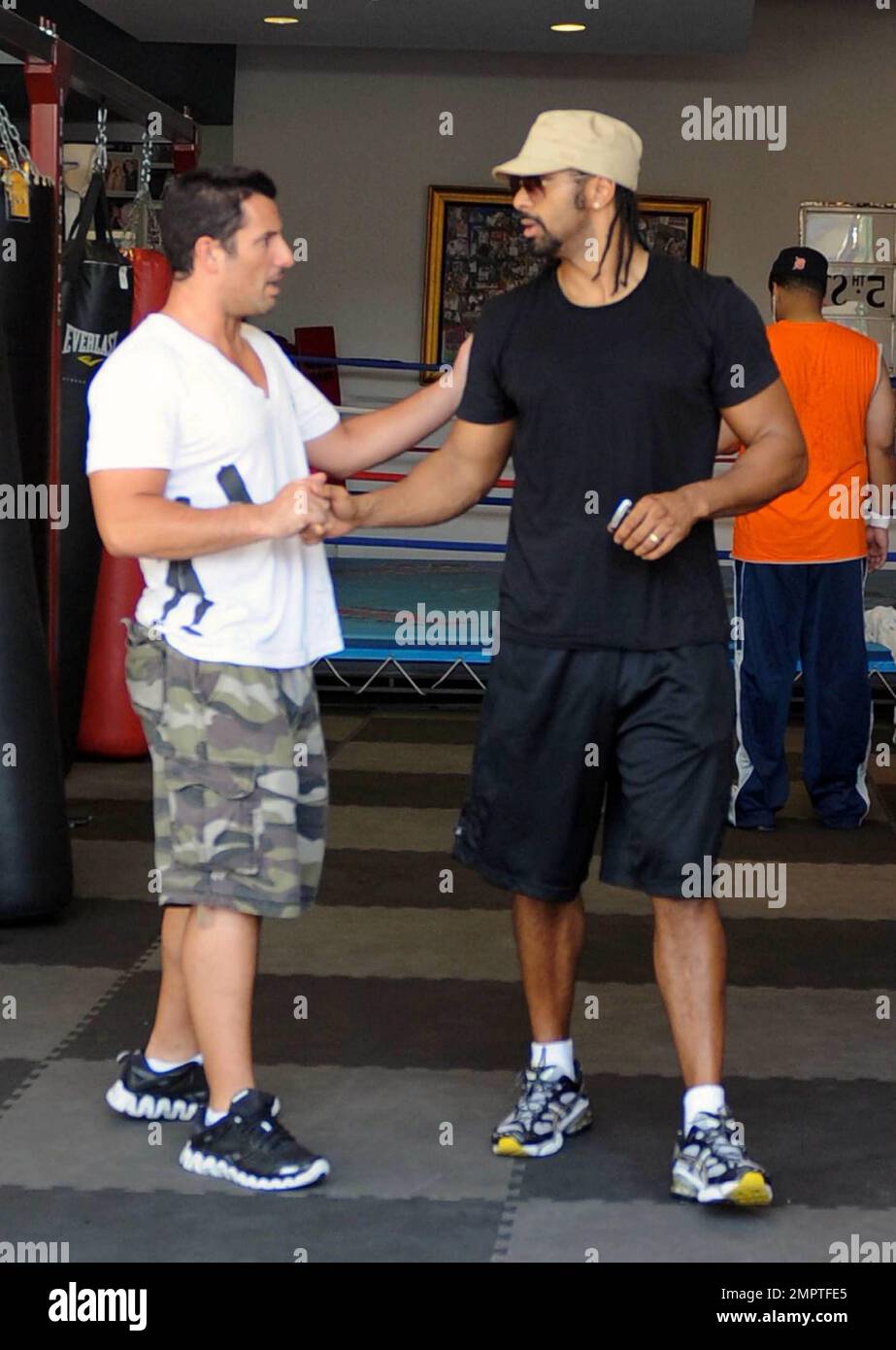 EXCLUSIVE!! After stopping to fill up his Aston Martin sports car with ...