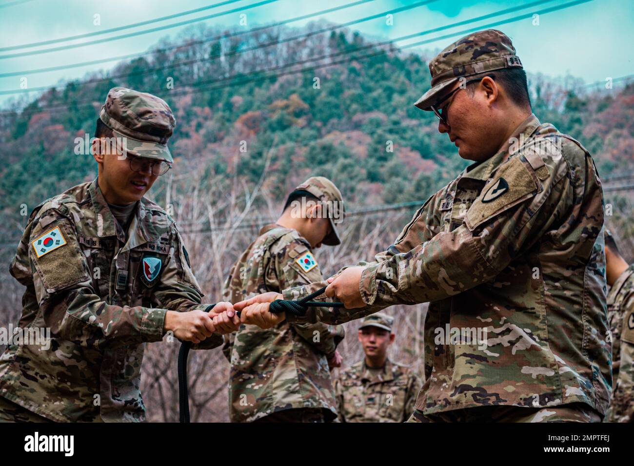 U.S. ARMY Soldiers and South Korean Katusa's Conduct a Ruck march and ...