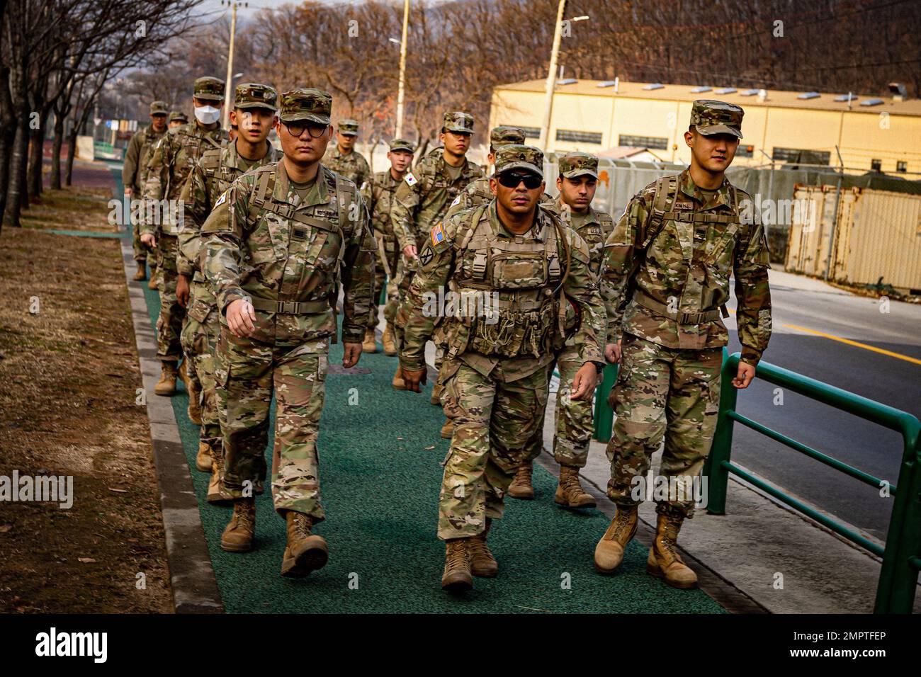 U.S. ARMY Soldiers and South Korean Katusa's Conduct a Ruck march and ...