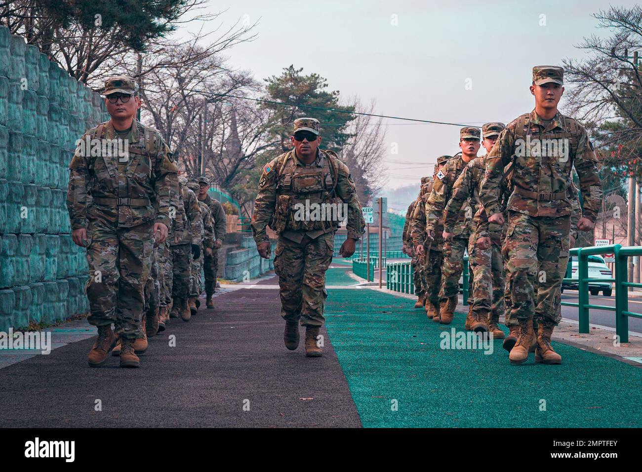 U.S. ARMY Soldiers and South Korean Katusa's Conduct a Ruck march and ...