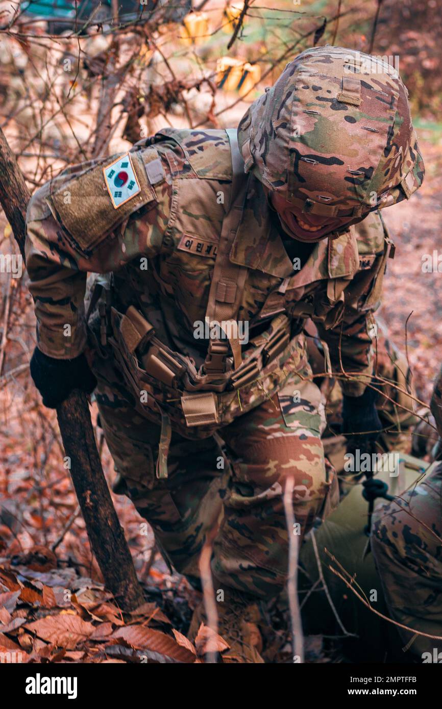 U.S. ARMY Soldiers and South Korean Katusa's Conduct a Ruck march and ...