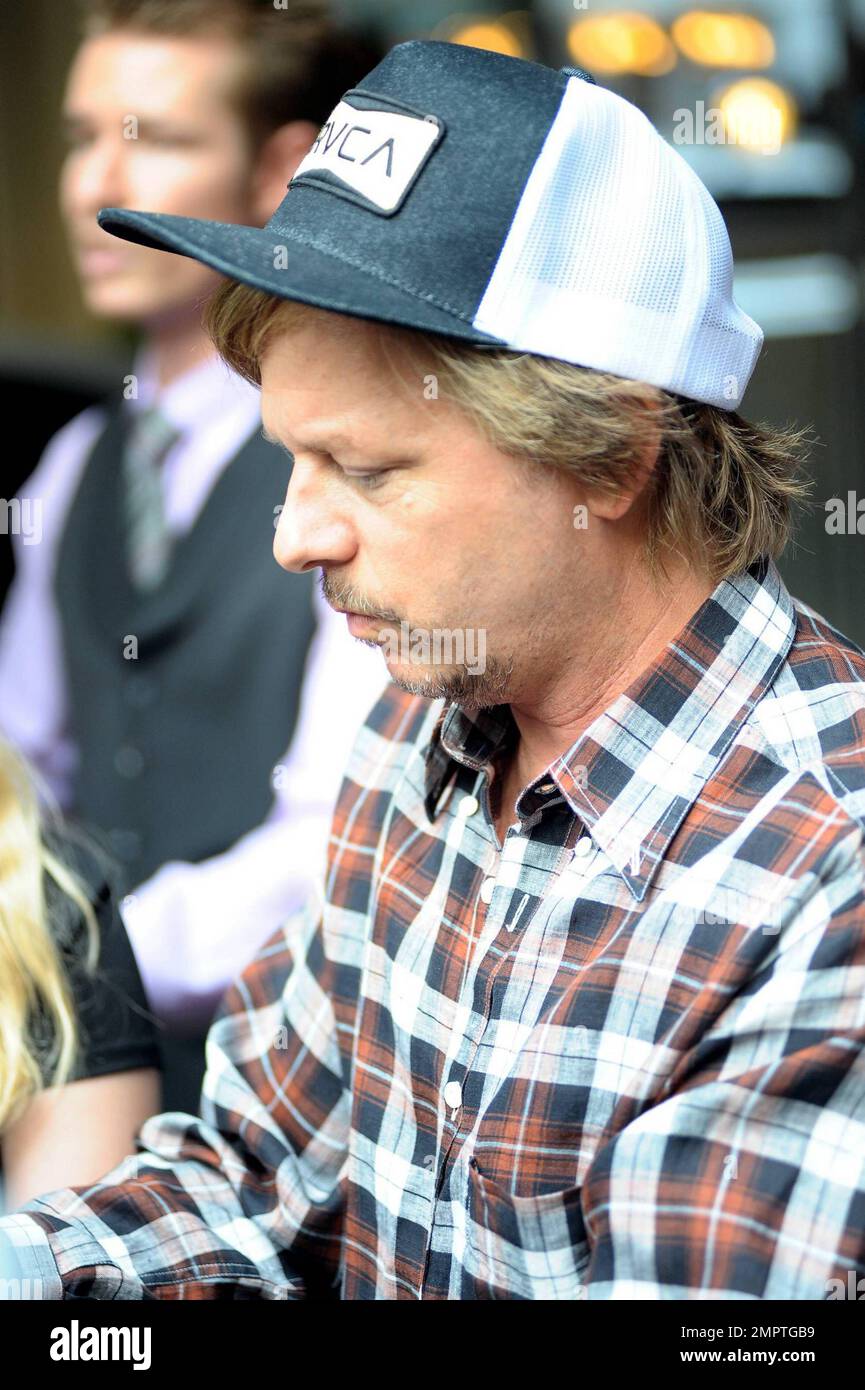 Funnyman and "Grown Ups" star David Spade signs autographs and waves to ...