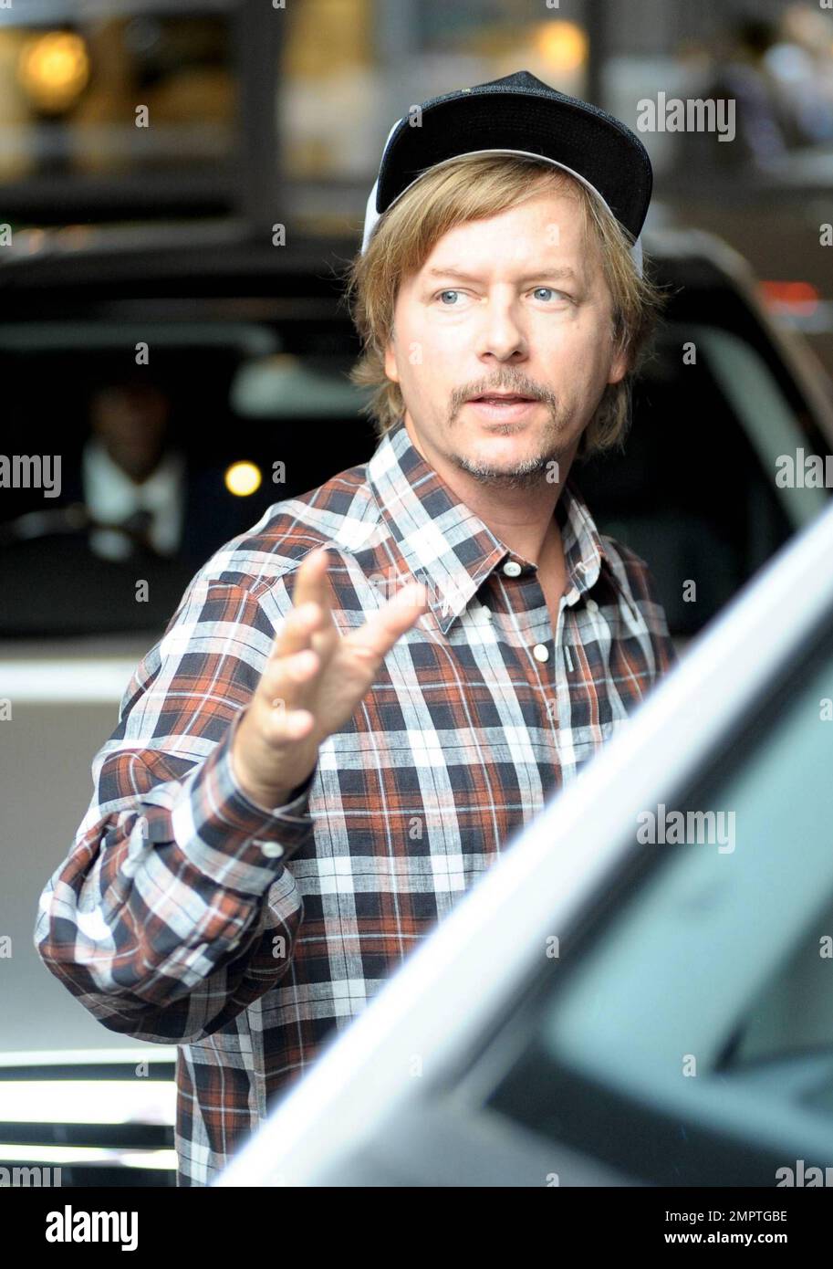 Funnyman and "Grown Ups" star David Spade signs autographs and waves to ...