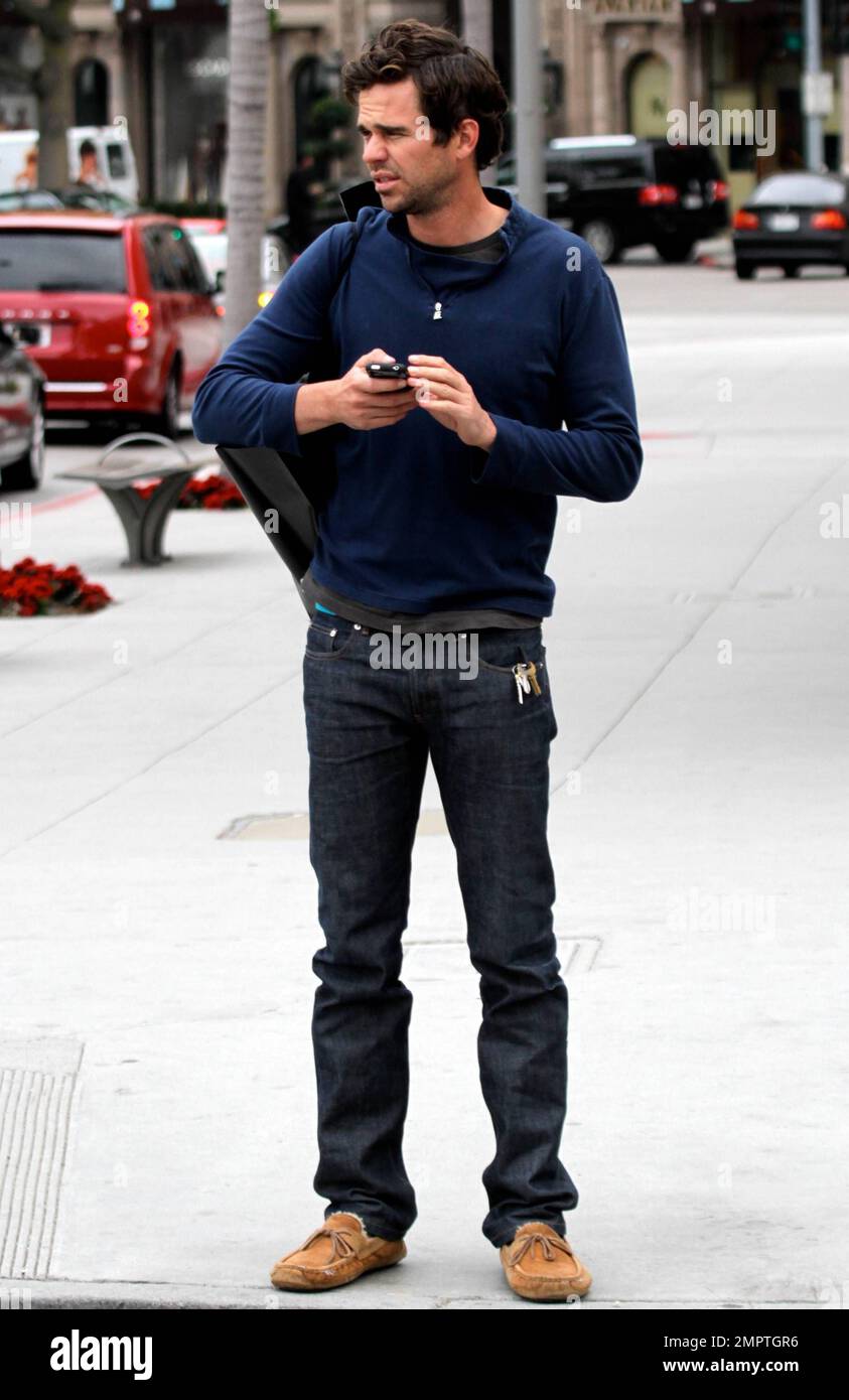 EXCLUSIVE!! Actor David Walton wears a blue shirt, jeans and moccasins ...