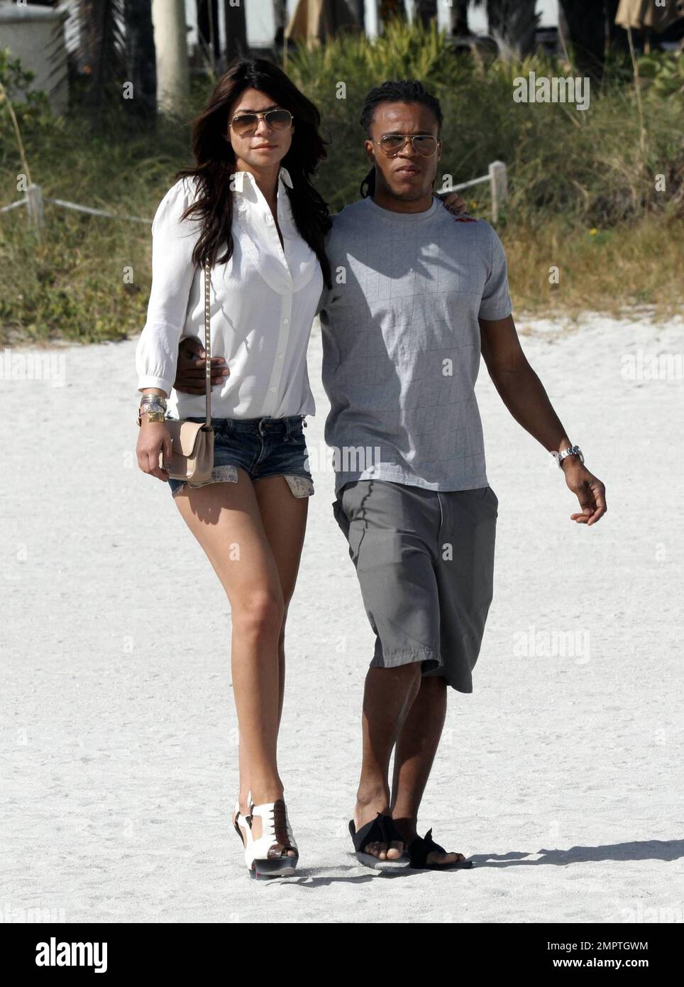 Dutch professional footballer, Edgar Davids, spends time on the beach ...