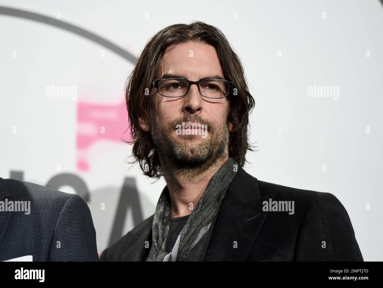 Rob Bourdon of Linkin Park poses in the press room with the award for ...
