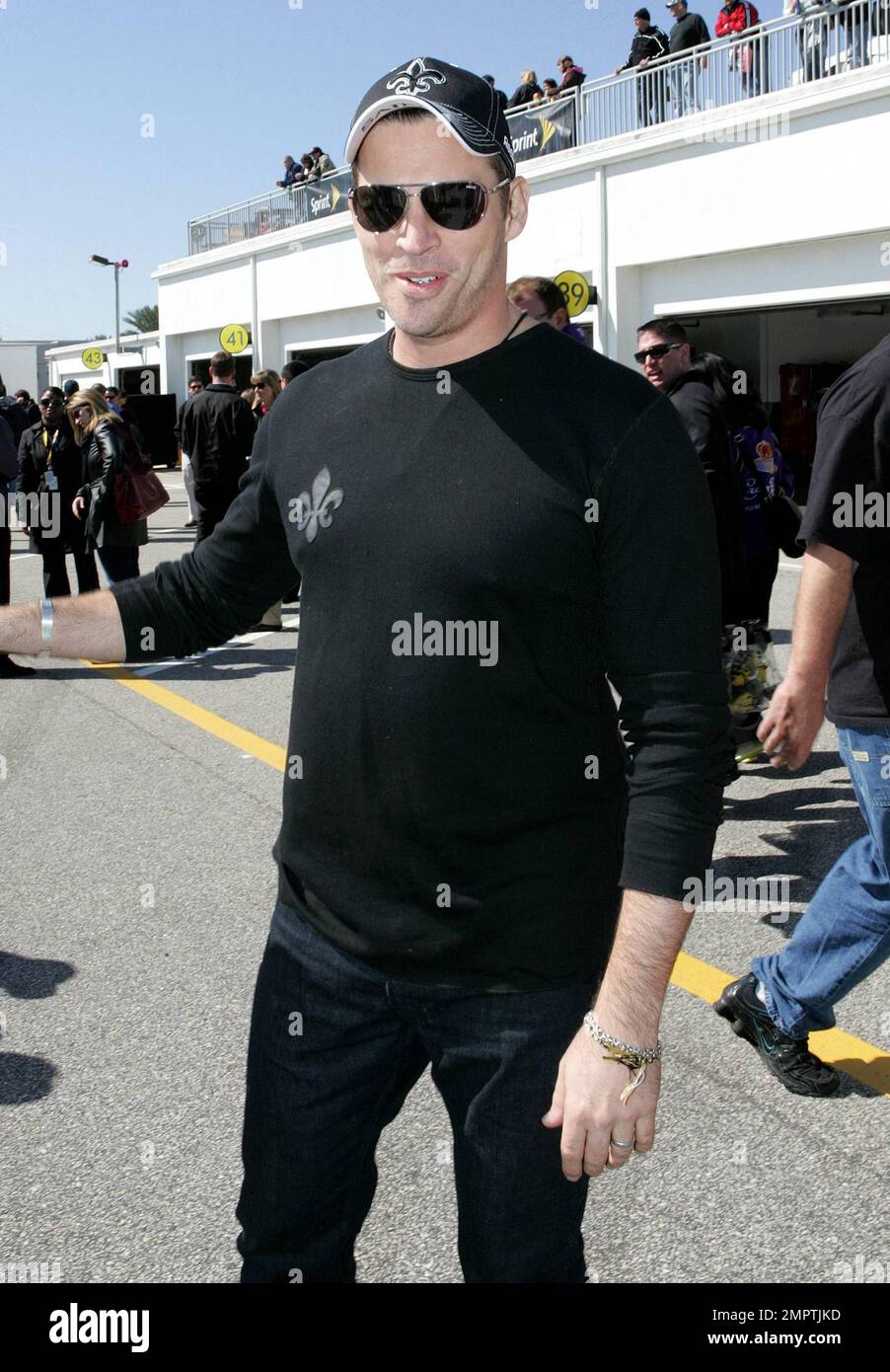 Singer Harry Connick Jr. tours the garage area prior to the start of ...