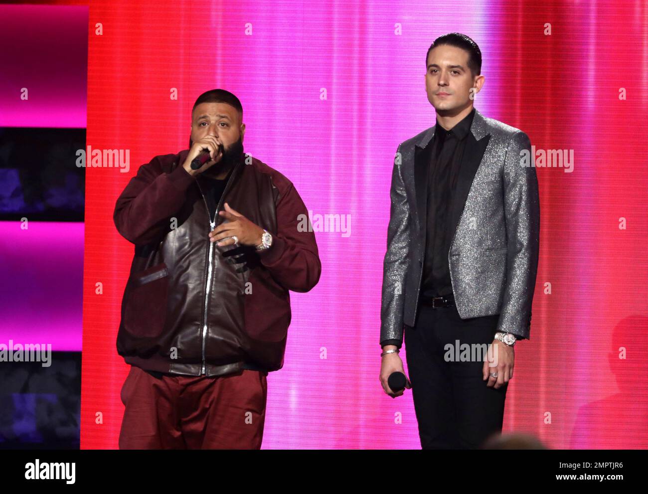 DJ Khaled, left, and G-Eazy introduce a performance by Macklemore and ...
