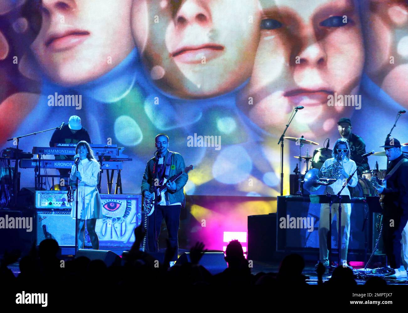 John Gourley, center, of Portugal. The Man performs "Feel It Still" at ...