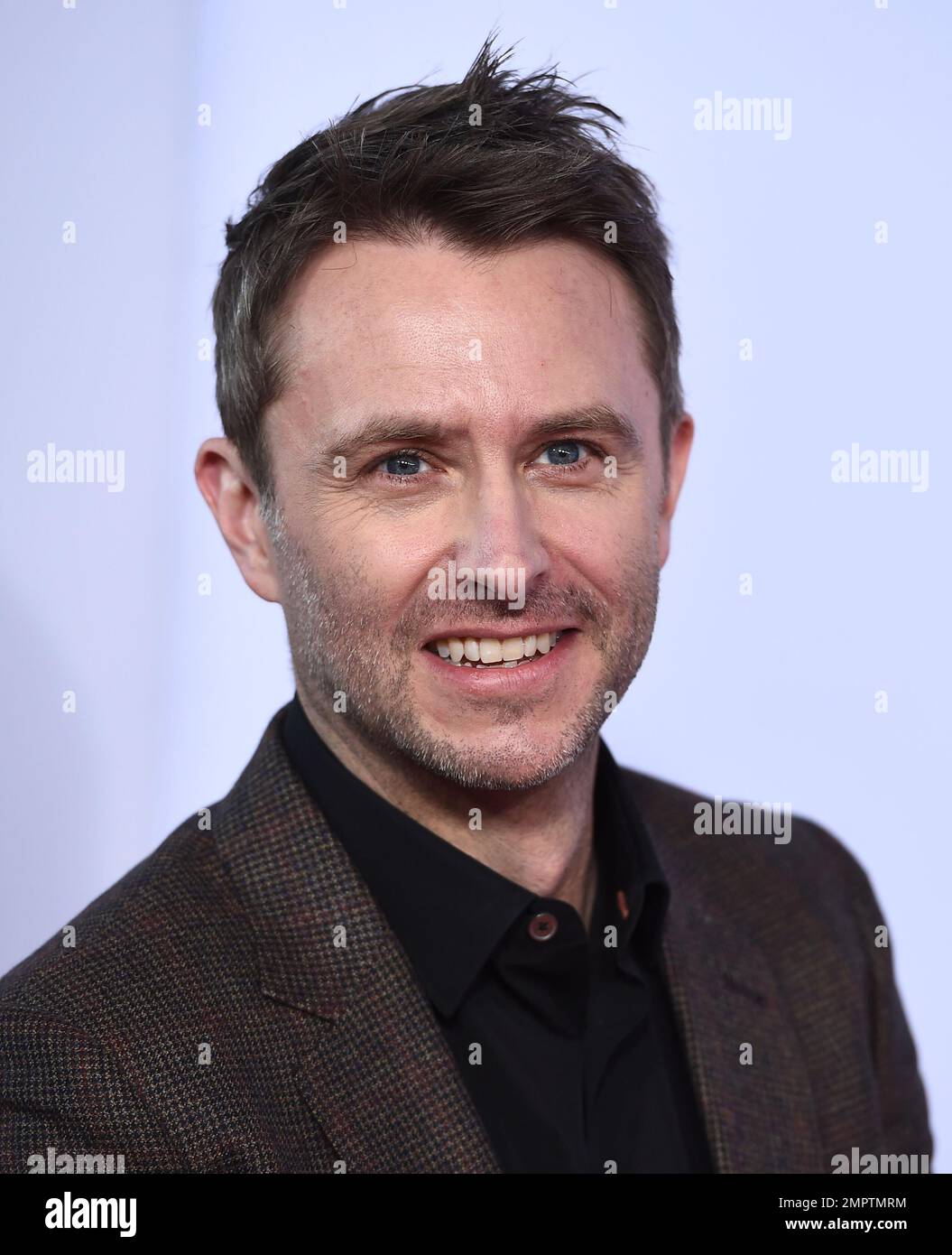 Chris Hardwick arrives at the American Music Awards at the Microsoft ...