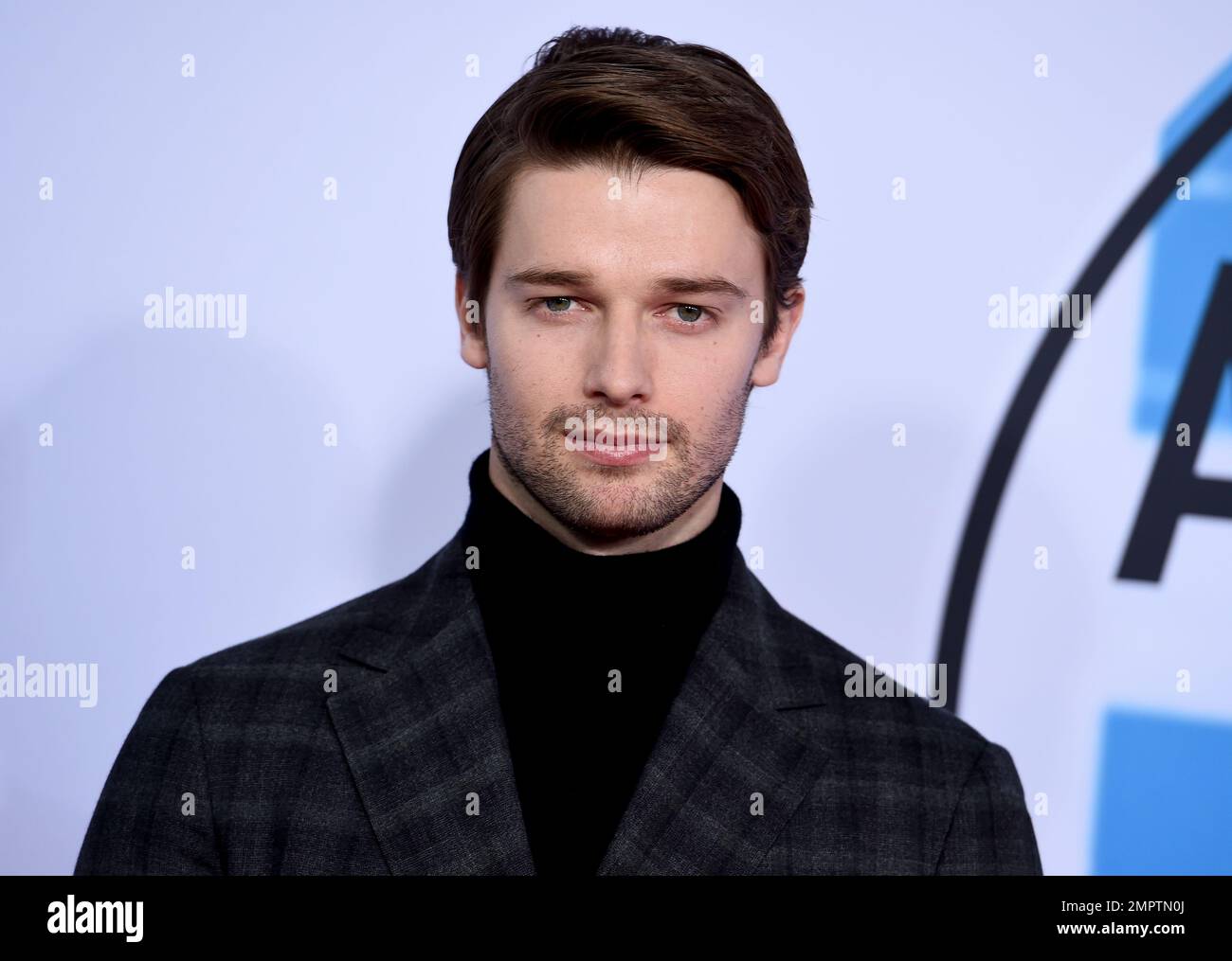 Patrick Schwarzenegger arrives at the American Music Awards at the ...