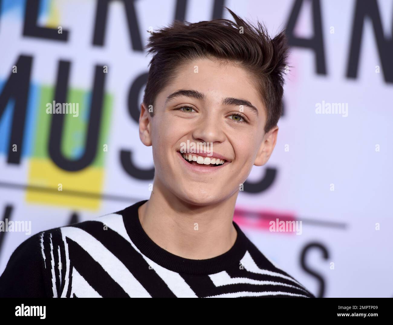 Asher Angel arrives at the American Music Awards at the Microsoft Theater on Sunday, Nov. 19 ...
