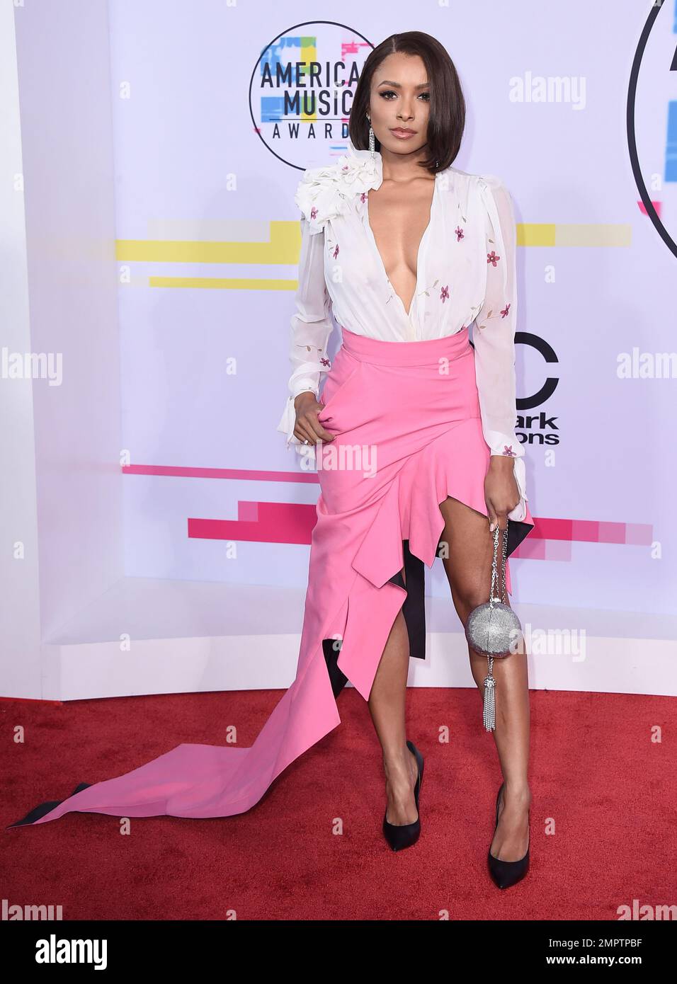 Kat Graham arrives at the American Music Awards at the Microsoft ...