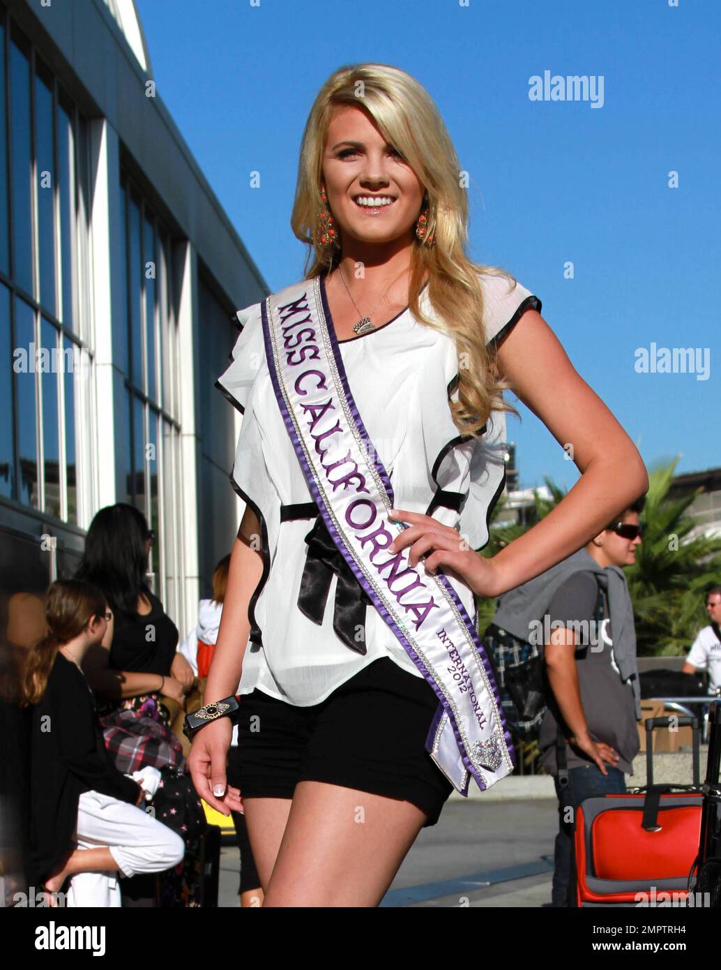 Miss California International 2012 Dedria Brunett wears her sash as she ...