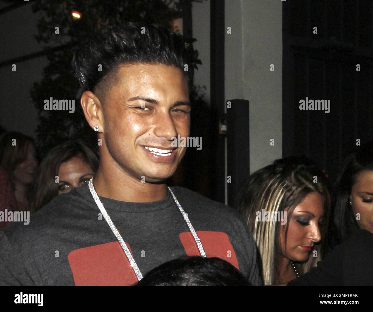 Wearing emerald contacts to hide her naturally brown eyes, thick blonde ...