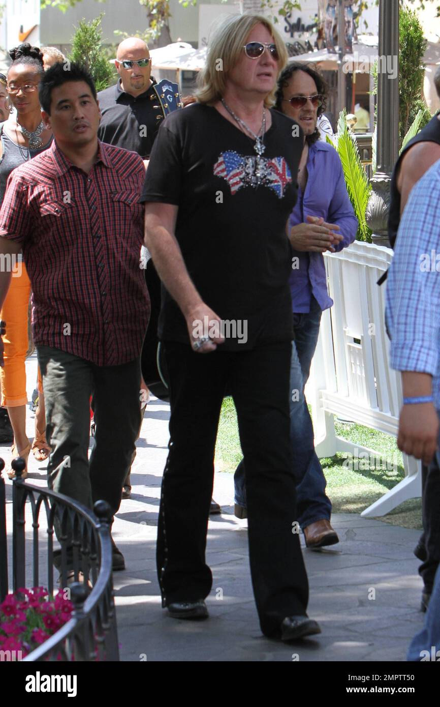 Def Leppard performs an acoustic set during a television appearance at ...