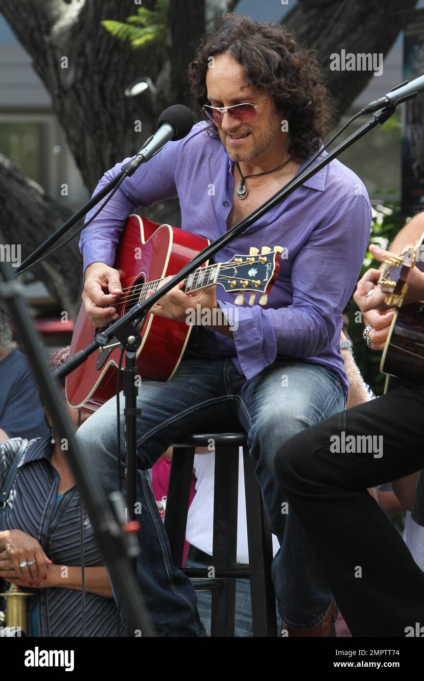 Def Leppard performs an acoustic set during a television appearance at ...
