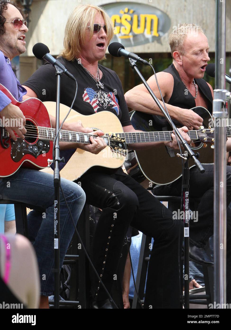 Def Leppard performs an acoustic set during a television appearance at ...