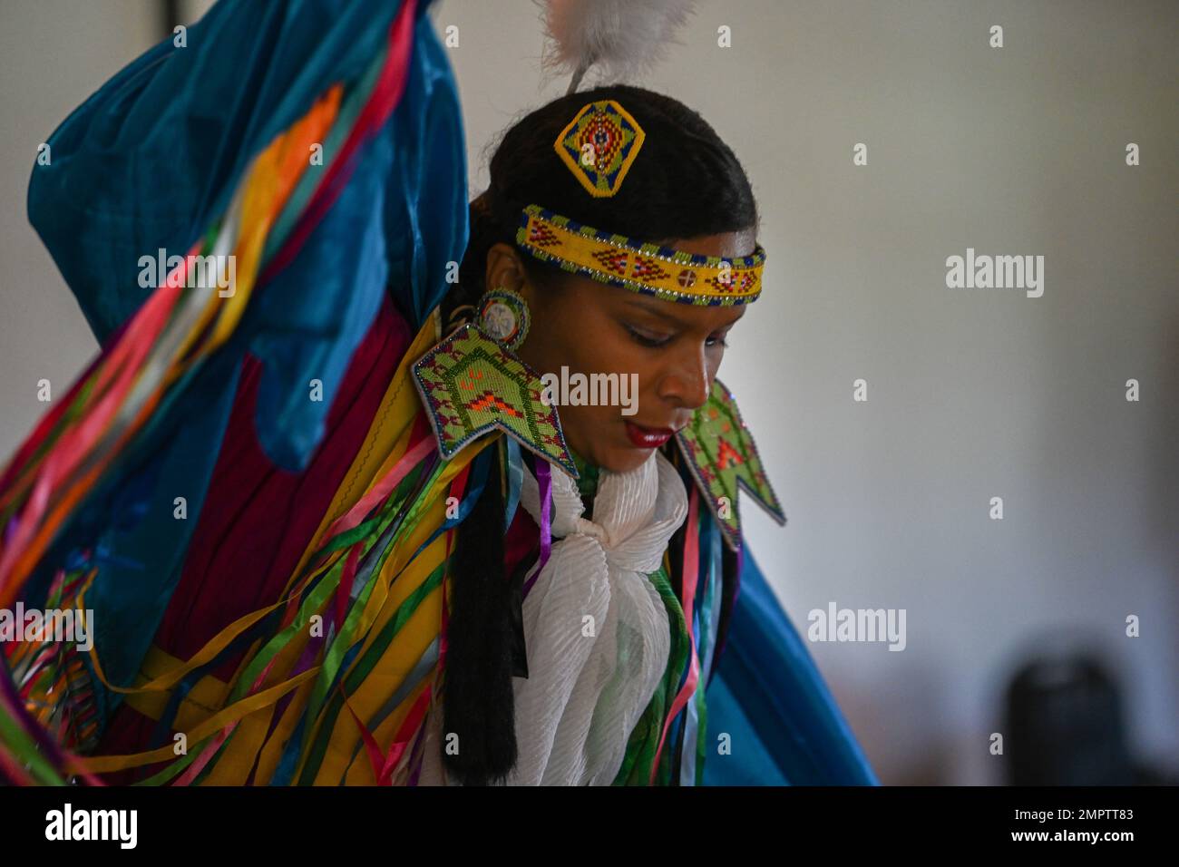 Deneshia Smith, a Native American performer, dances during a Native ...