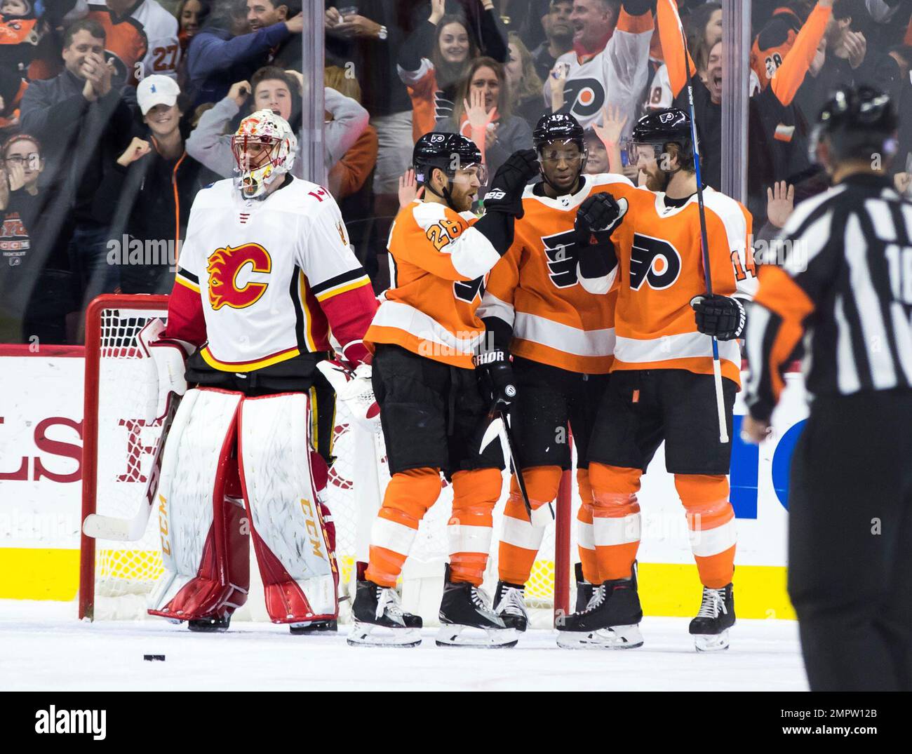 Philadelphia Flyers' Sean Couturier, right, celebrates his goal on ...