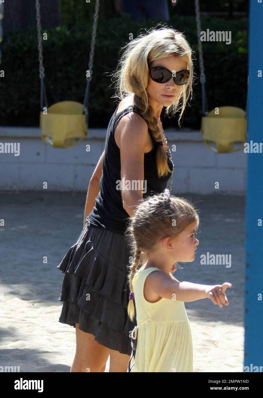 Denise Richards takes her two daughters, Sam and Lola Rose, to the park ...