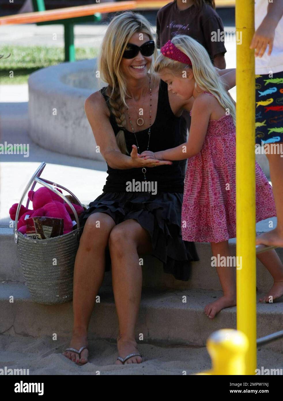 Denise Richards takes her two daughters, Sam and Lola Rose, to the park ...