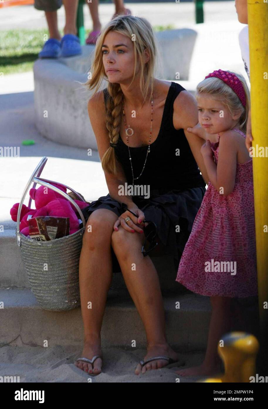 Denise Richards takes her two daughters, Sam and Lola Rose, to the park ...