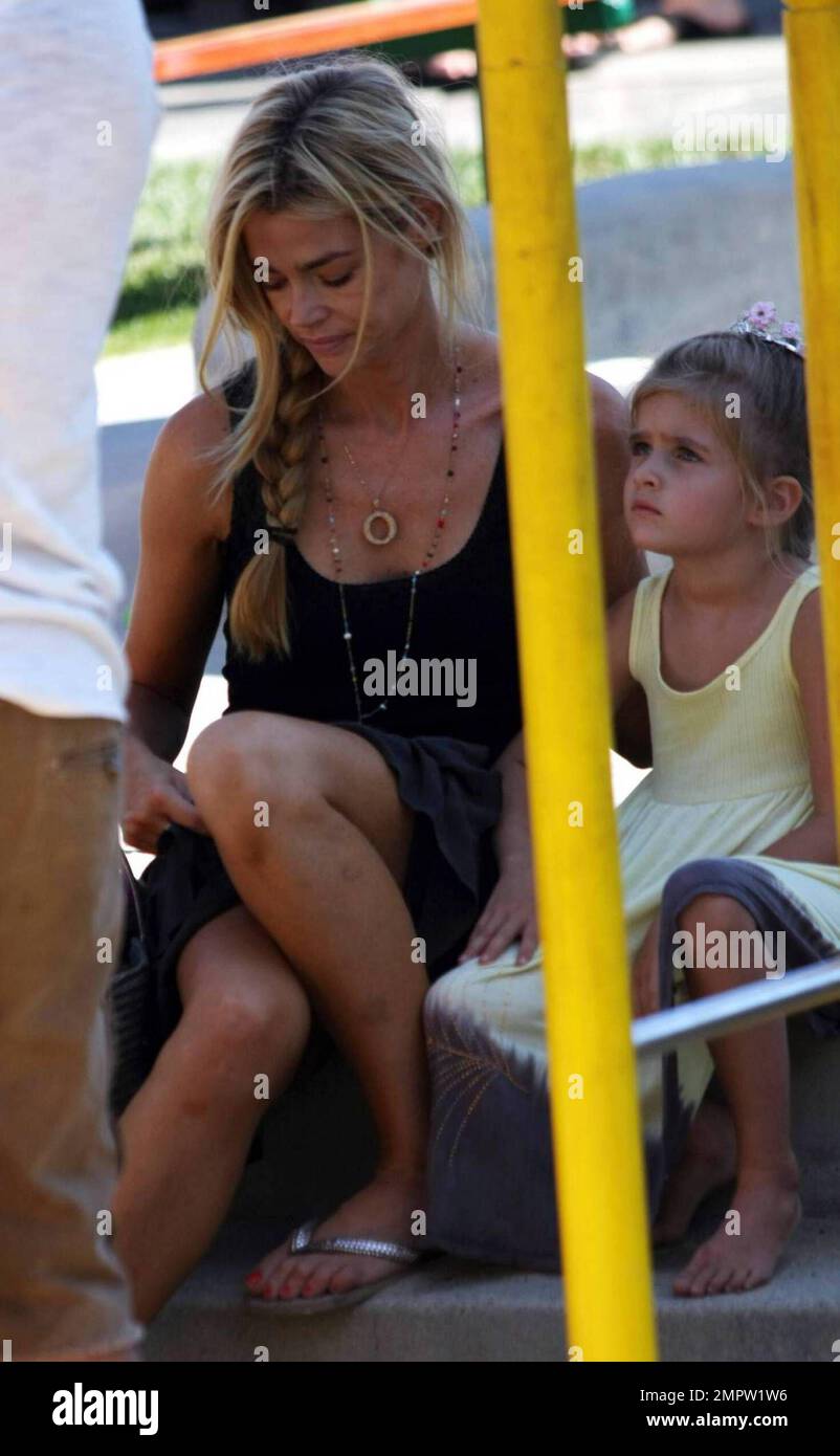 Denise Richards takes her two daughters, Sam and Lola Rose, to the park ...