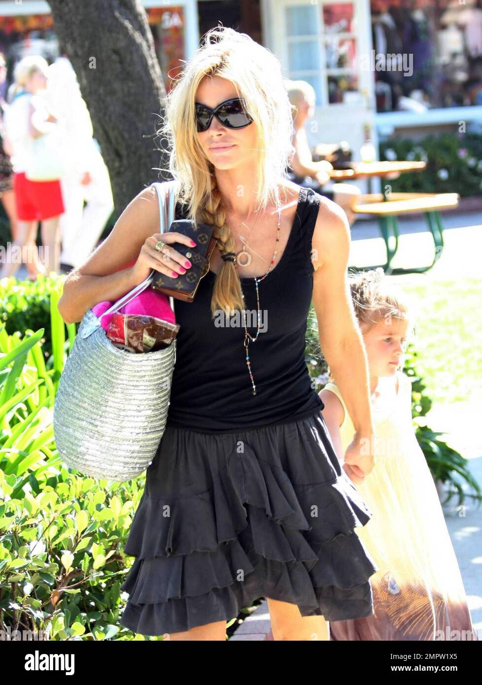 Denise Richards takes her two daughters, Sam and Lola Rose, to the park ...